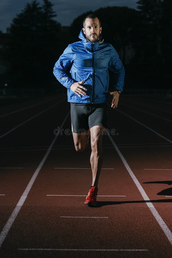 Attractive Man Track Athlete Running on Track Stock Photo - Image of ...