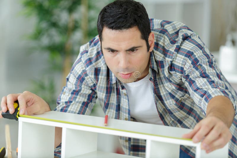 Attractive Man Using Tape Measure Stock Image - Image of drilling, copy ...