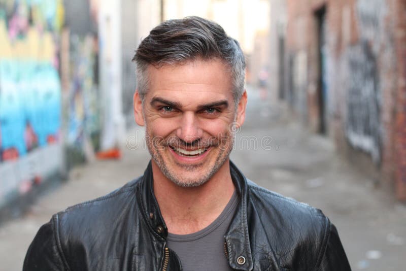 Attractive Man with a Very Cynical Smile Stock Image - Image of dark ...