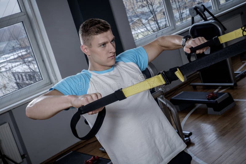 Attractive Man during Workout with Suspension Straps Stock Image ...