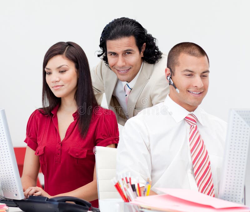 Attractive Manager Checking His Team Work Stock Photo - Image of ...