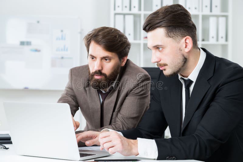 Attractive Men Discussing Business Project Stock Image - Image of ...