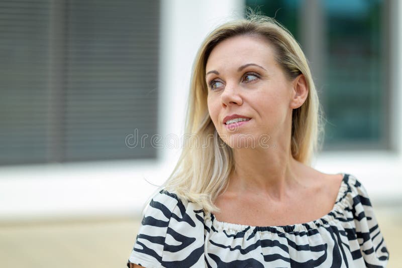Attractive Middle Aged Woman Looking Back Over Her Shoulder Stock Image ...
