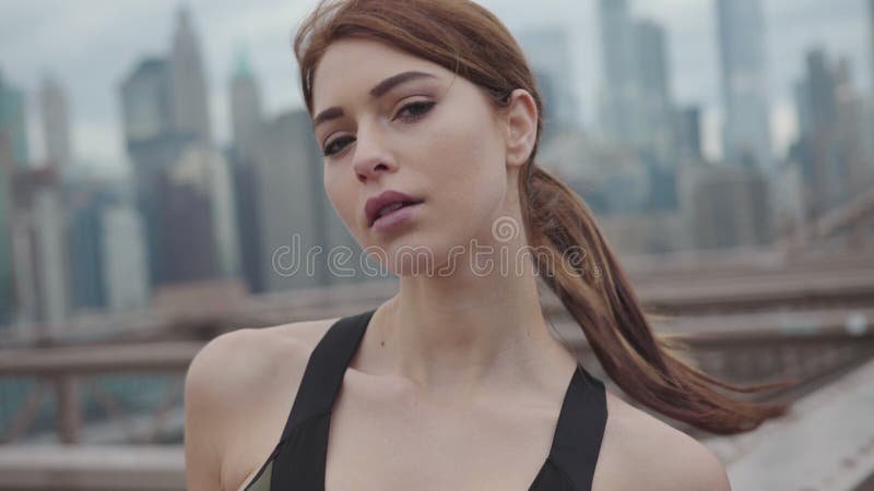 Attractive Model on a Bridge with the Beautiful New York Skyline in the ...