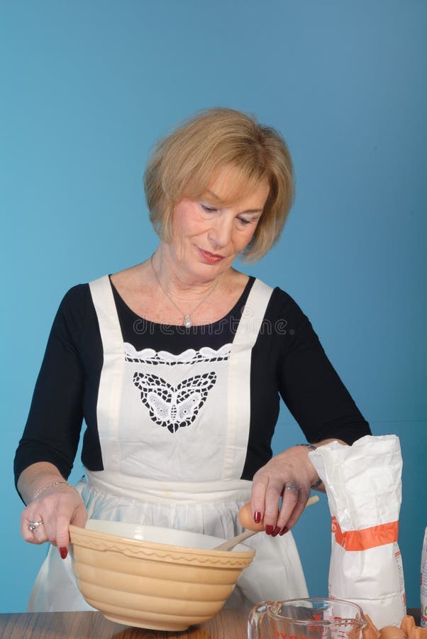Attractive Older Lady Preparing Food Stock Image - Image of maturity ...
