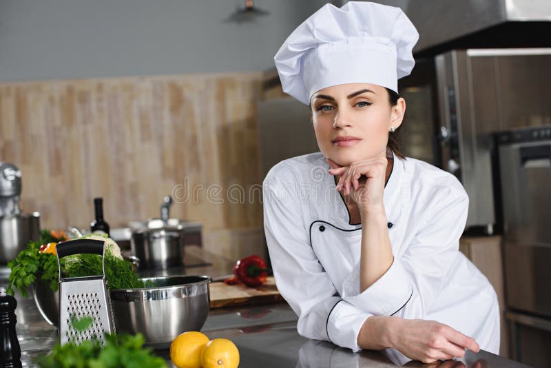 Attractive Pensive Chef Looking at Camera Stock Photo - Image of ...