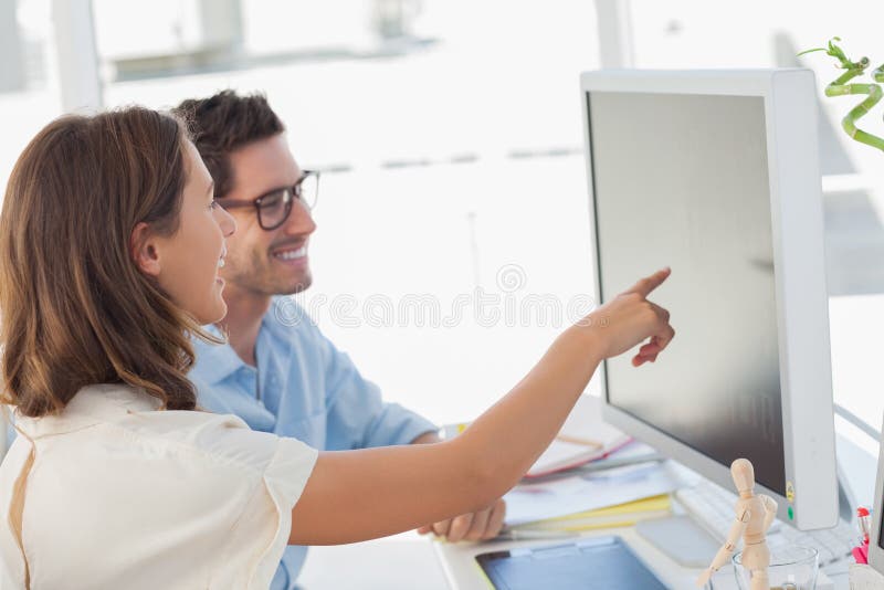 Attractive Photo Editor Pointing at the Screen Stock Image - Image of ...