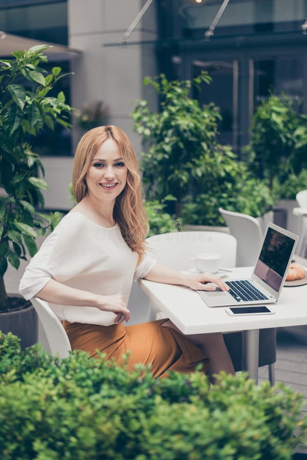 Attractive, Pretty, Elegant Manager Using Modern Devices Working Stock ...