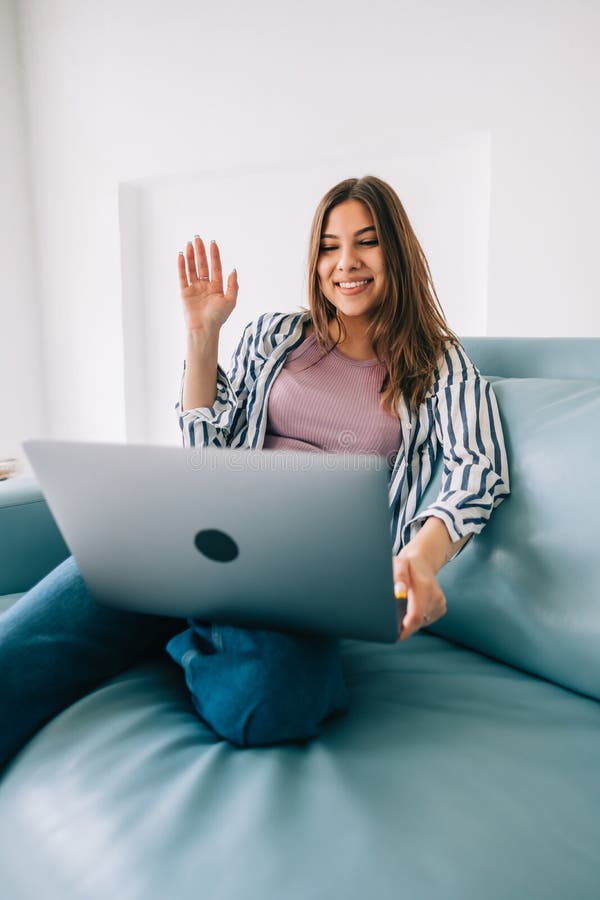 Attractive Pretty Young Woman Using Laptop Computer, Sitting on ...