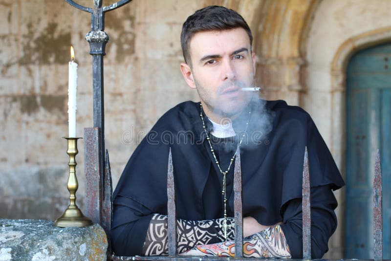 Attractive Priest Smoking a Cigarette Stock Image - Image of candle ...