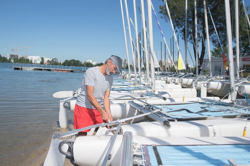 Attractive Sailor Rigging Hobbie-cat before Sailing Course Stock Image ...
