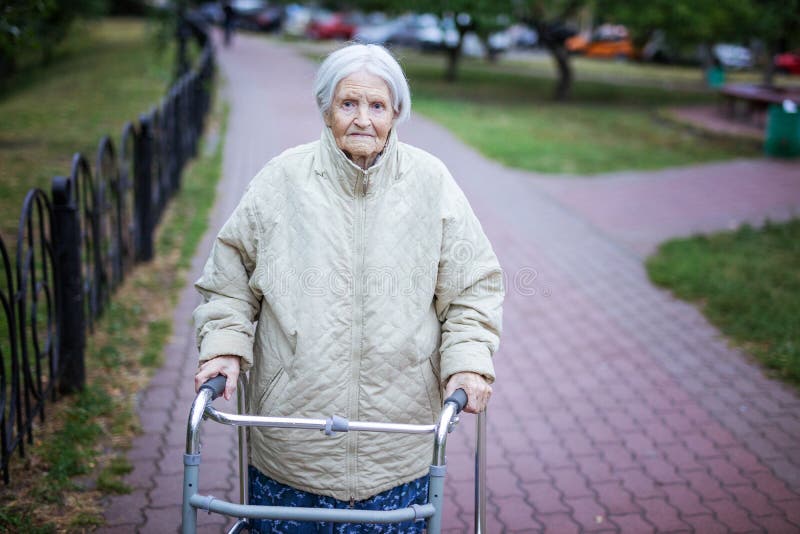 Attractive Senior Woman with Walker Stock Photo - Image of attractie ...