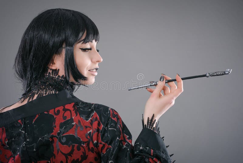 Attractive And Lady With Cigarette Holder. Stock Photo - Image of ...