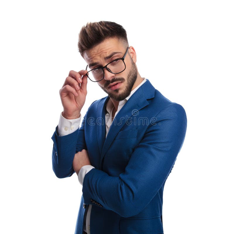 Attractive Smart Casual Man Fixing His Glasses is Skeptical Stock Image ... Attractive Smart Casual Man Fixing His Glasses is Skeptical Stock Image ...