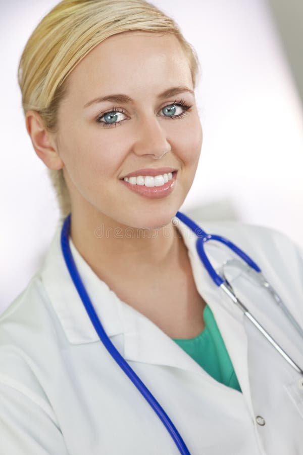 Attractive Smiling Woman Doctor with Stethoscope Stock Photo - Image of ...