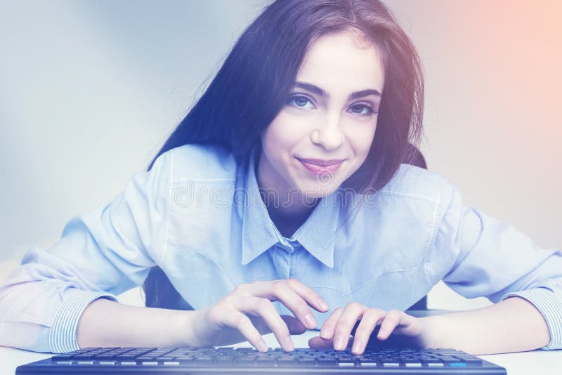Attractive Smiling Woman is Using Keyboard Stock Image - Image of ...