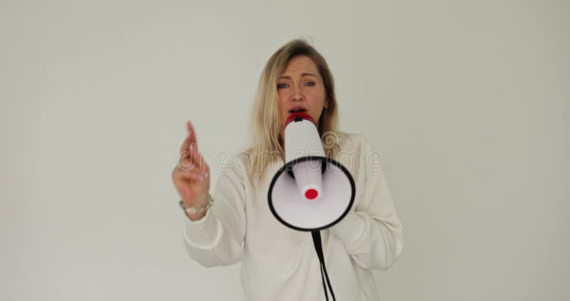 Attractive Speaker Sharing a Powerful Message with Megaphone on White ...