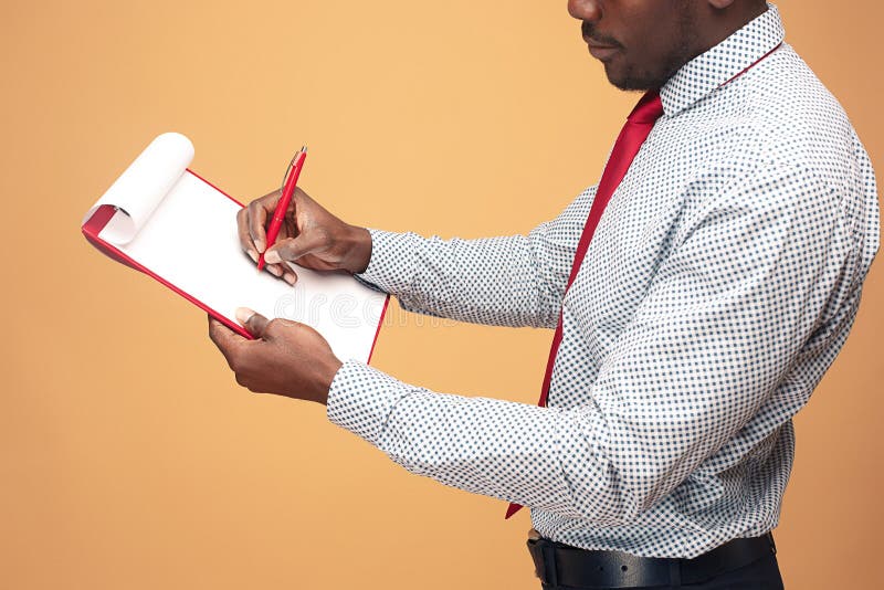 Attractive Standing Afro-American Businessman Writing Notes Stock Photo ...