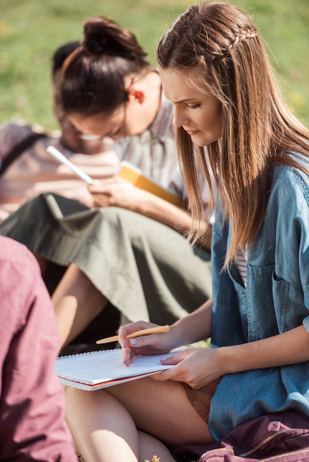 Attractive Student Taking Notes Stock Image - Image of classmates ...