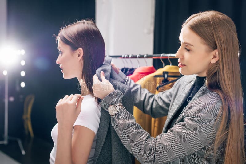 Stylist Wearing Jacket on Young Model Stock Image - Image of stylish ...