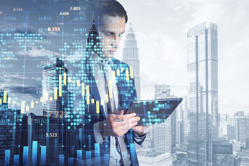 Attractive Thoughtful Young European Businessman Using Tablet with ...