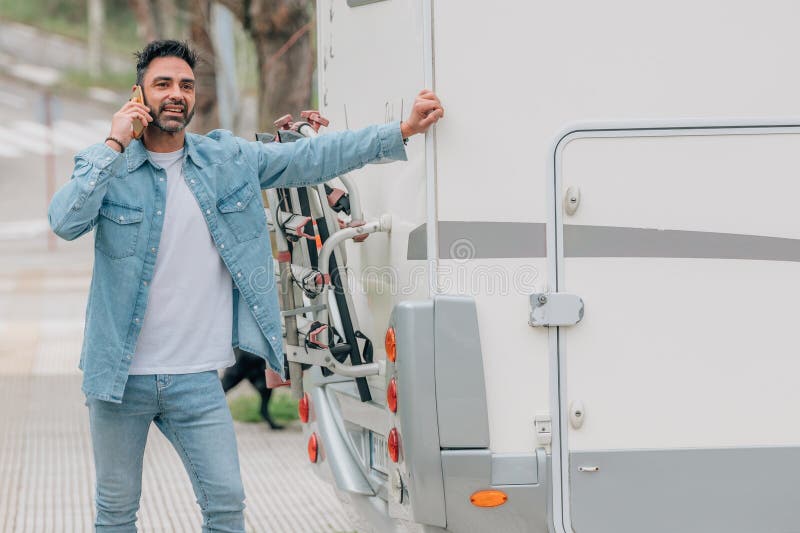 Traveler Man with Caravan and Mobile Phone Stock Photo - Image of road ...