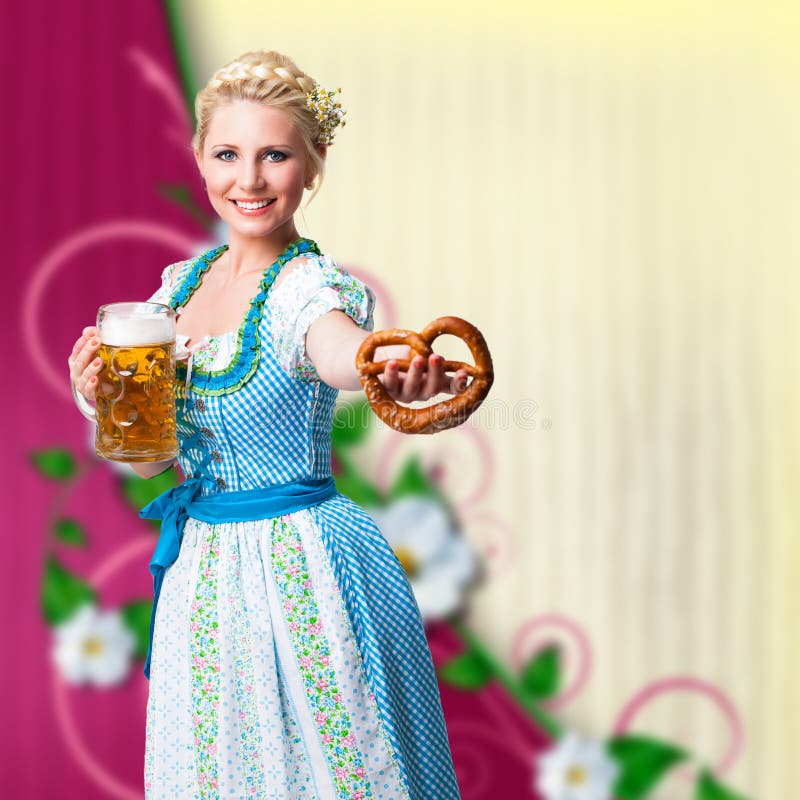 Attractive Woman in a Dirndl with Beer and Pretzel Stock Image - Image ...