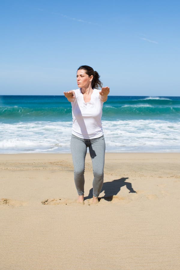 Attractive Woman Doing Cross-fit on the Beach Stock Photo - Image of ...