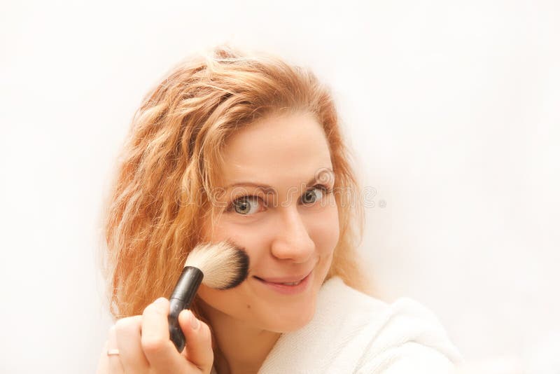 Attractive Woman Doing Make-up on Face. Stock Photo - Image of people ...