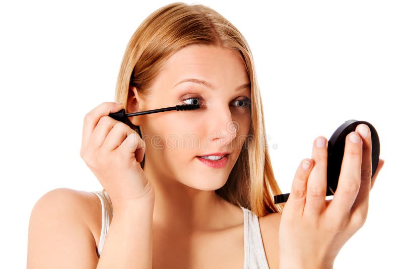 Attractive Woman Doing Make-up on Face. Isolated Stock Image - Image of ...