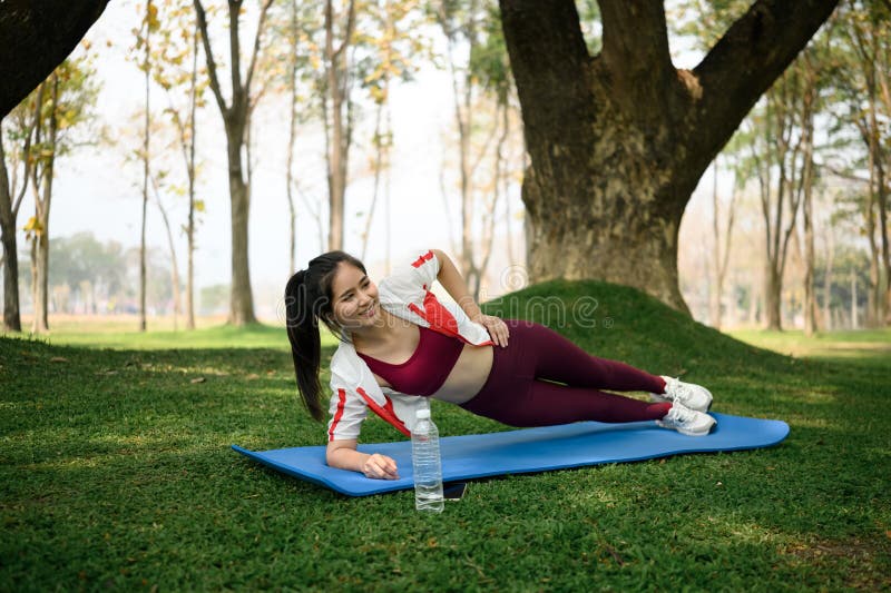 Attractive Woman Doing Side Plank Exercise Yoga Mat Park Stock Photos ...