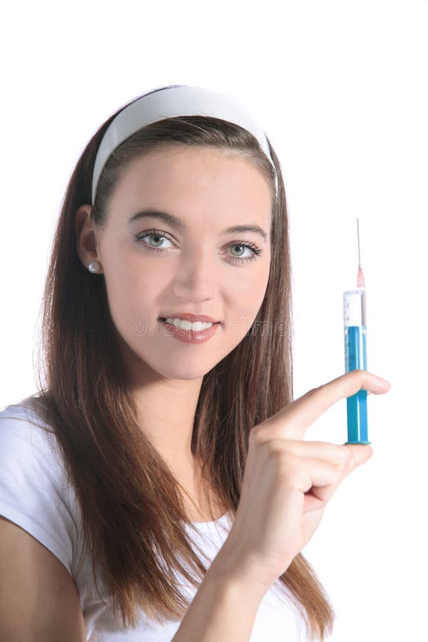 Attractive Woman Holding a Syringe Stock Photo - Image of smarting ...