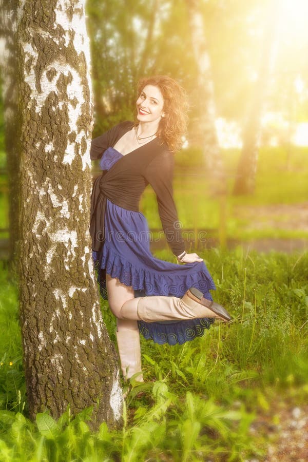 Attractive woman in nature stock image. Image of dress - 94853753