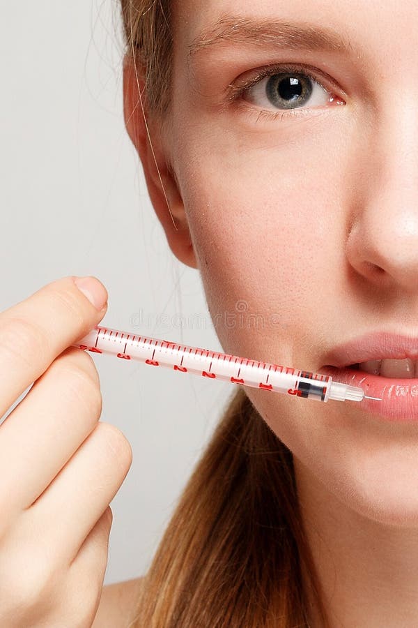 Attractive Woman Plastic Surgery with Syringe in Her Face Stock Image ...