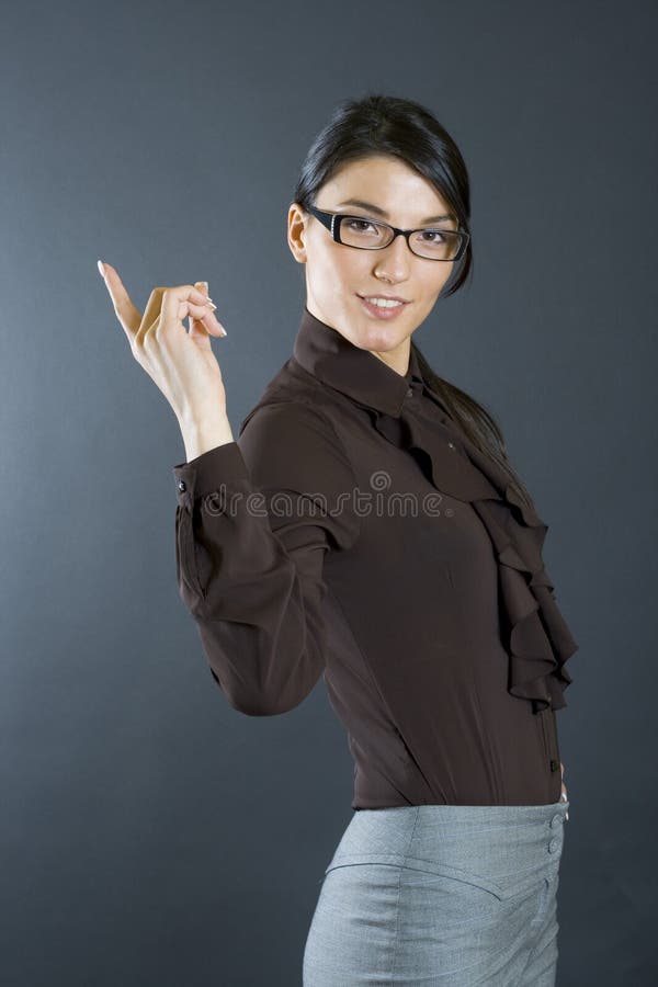 Attractive Woman Poiting at Something Stock Photo - Image of friendly ...