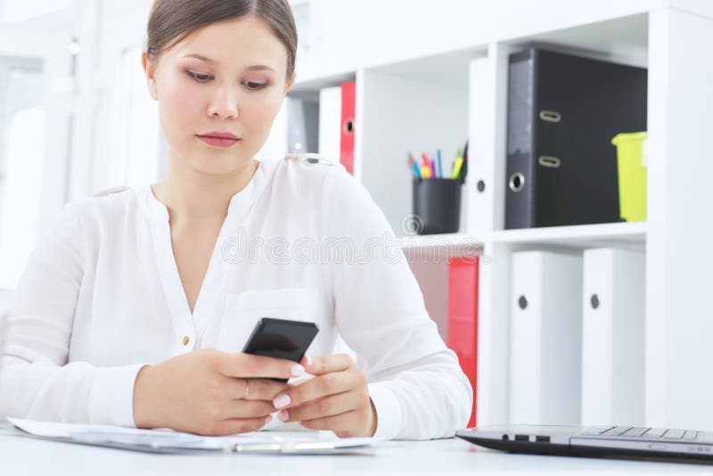 Young Attractive Woman Reading Text Message on Cell Telephone. Stock ...