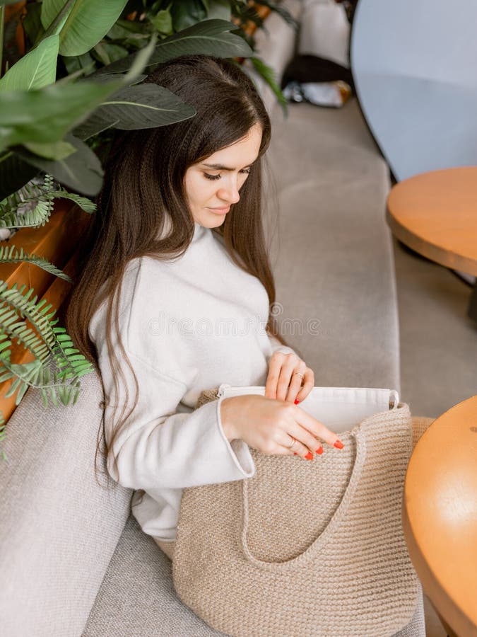 Attractive Woman Sitting with Bag in a Cafe Stock Image - Image of ...