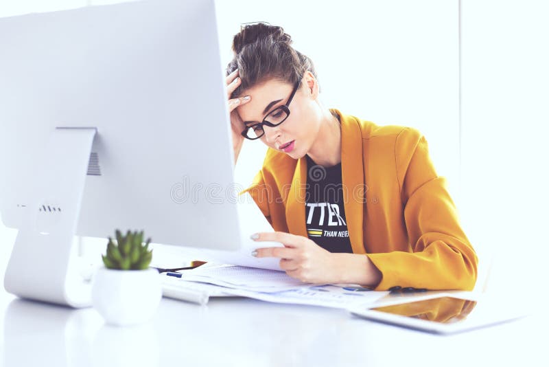 Attractive Woman Sitting at Desk in Office, Working with Laptop ...