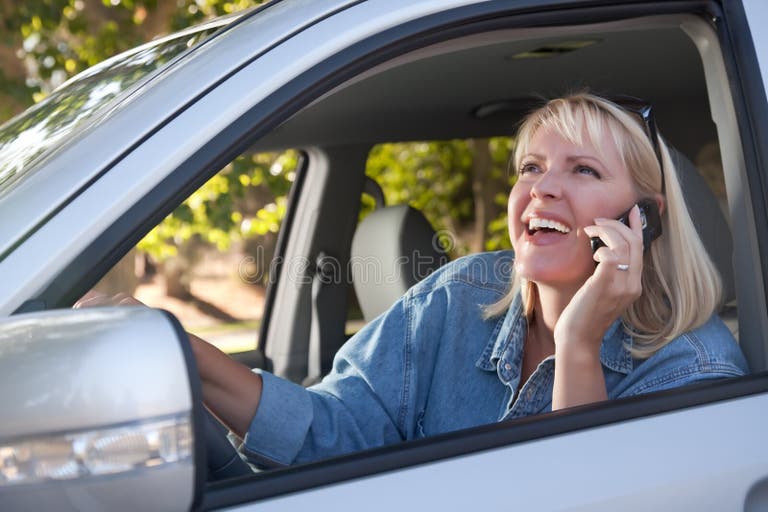 Attractive Woman Using Cell Phone while Driving Stock Image - Image of ...