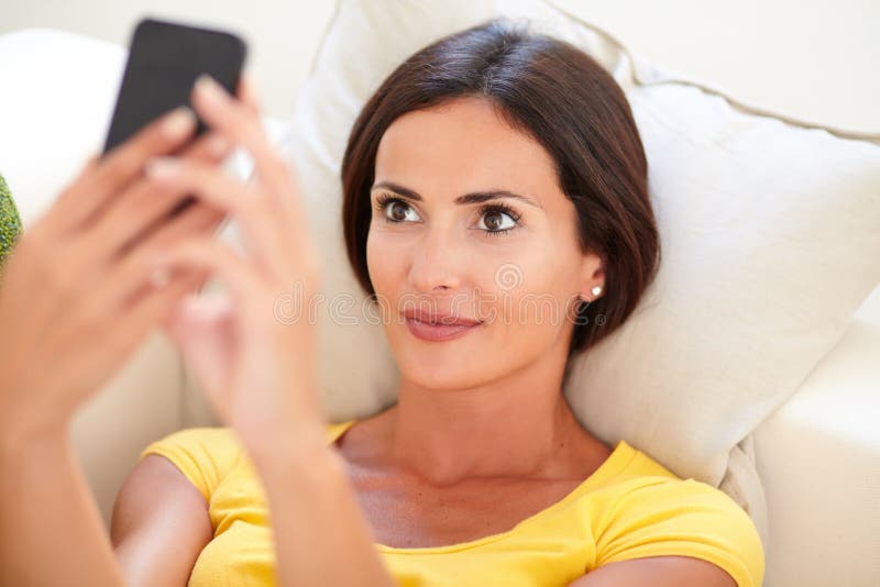 Attractive Woman Using a Cell Phone Stock Image - Image of peaceful ...