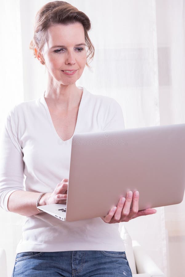 Attractive Woman Woman Working with Computer on Her Hands Stock Image ...