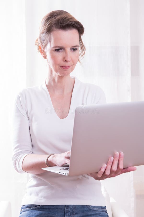 Attractive Woman Woman Working with Computer on Her Hands Stock Image ...