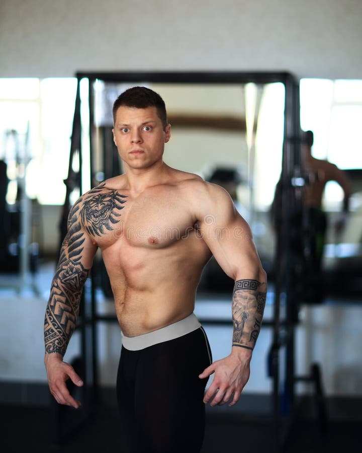 Bodybuilder Posing. Beautiful Sporty Guy Male Power Stock Image - Image ...