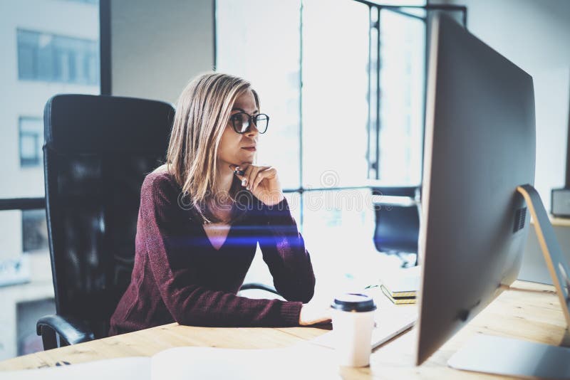 Attractive Young Businesswoman Using Desktop Computer At Modern Working ...