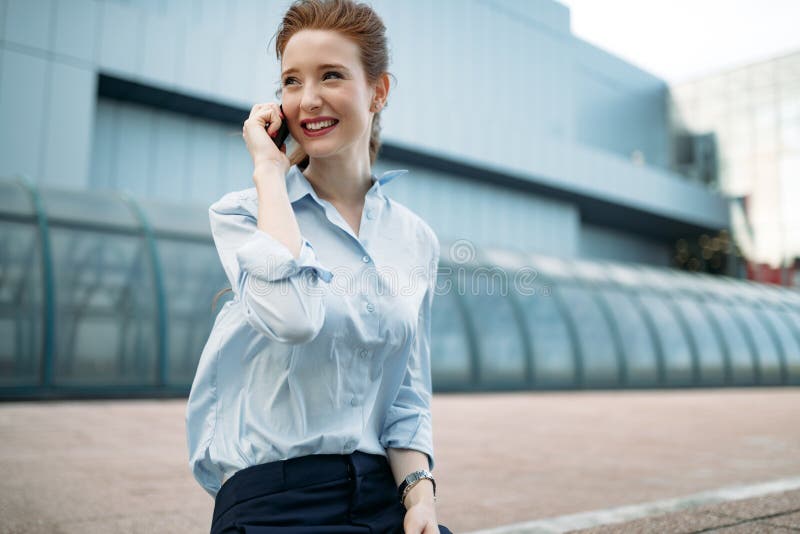 Attractive Young Businesswoman Using Mobile Phone Outside Stock Image ... Attractive Young Businesswoman Using Mobile Phone Outside Stock Image ...