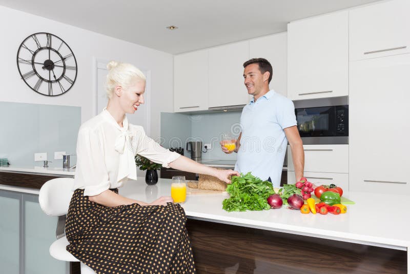 Couple in kitchen stock image. Image of domestic, contemporary - 29935497