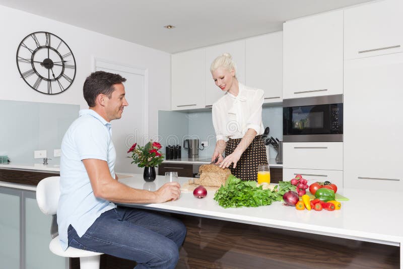 Couple in kitchen stock photo. Image of indoors, fruit - 29935504