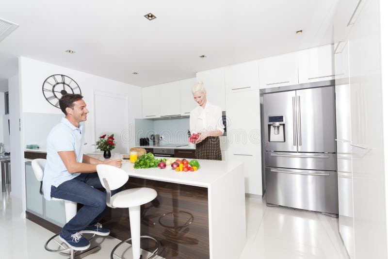 Couple in kitchen stock photo. Image of chair, indoors - 30218582