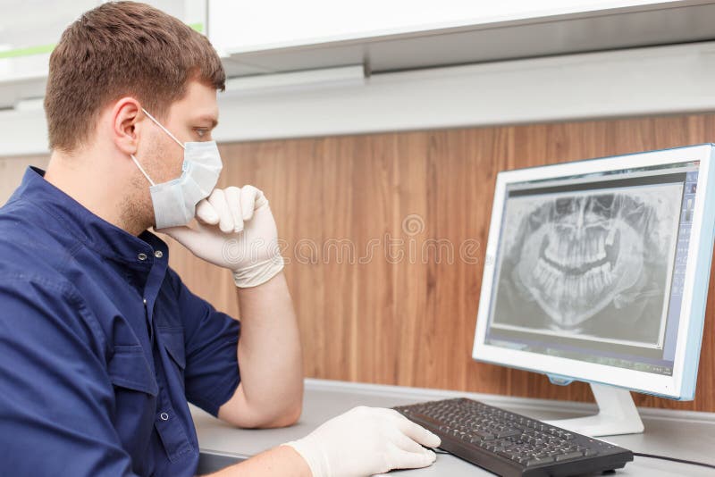 Attractive Young Dental Doctor is Working with Stock Photo - Image of ...