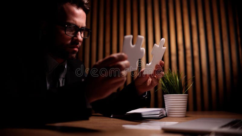 Attractive Young Guy is Solving a Problem Stock Image - Image of puzzle ...